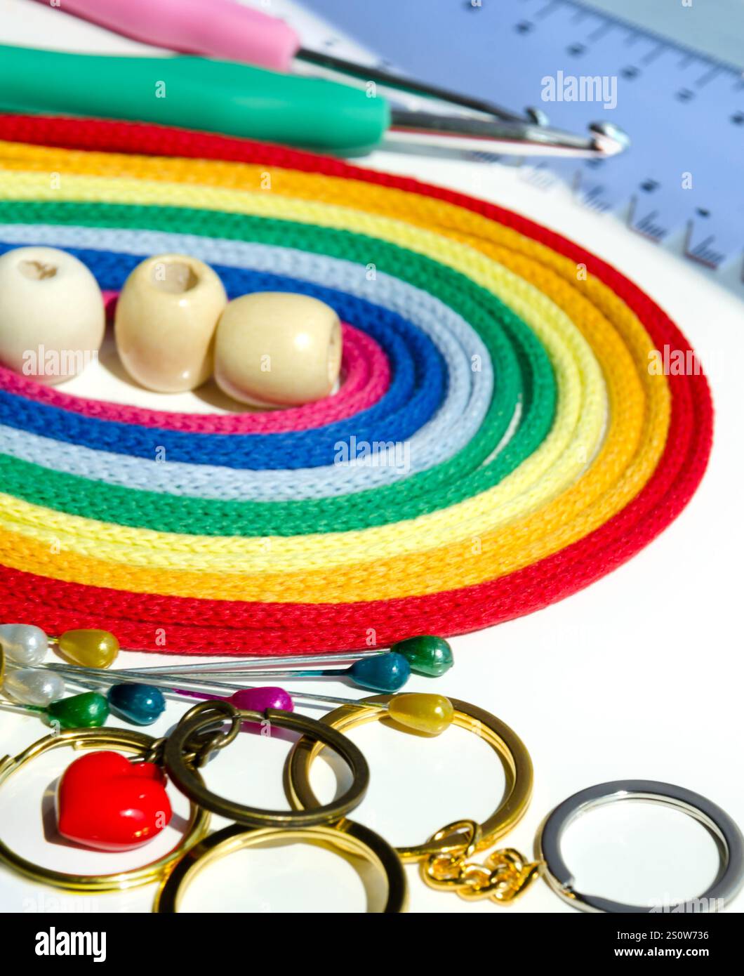 Cotton yarn with a core. Bright rainbow palette of multi-colored cotton threads, hooks and ...