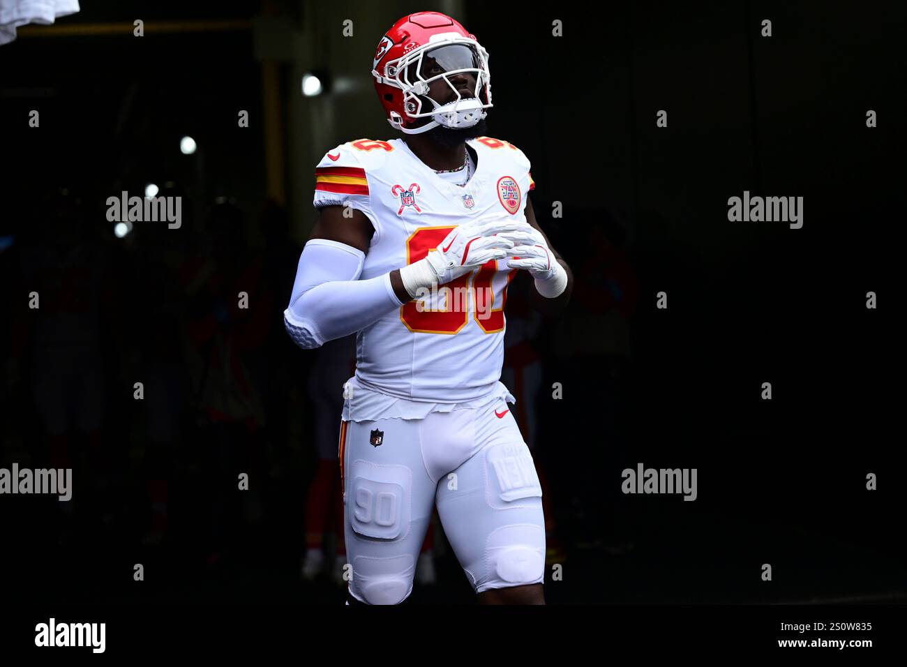 Kansas City Chiefs defensive end Charles Omenihu enters the field ...
