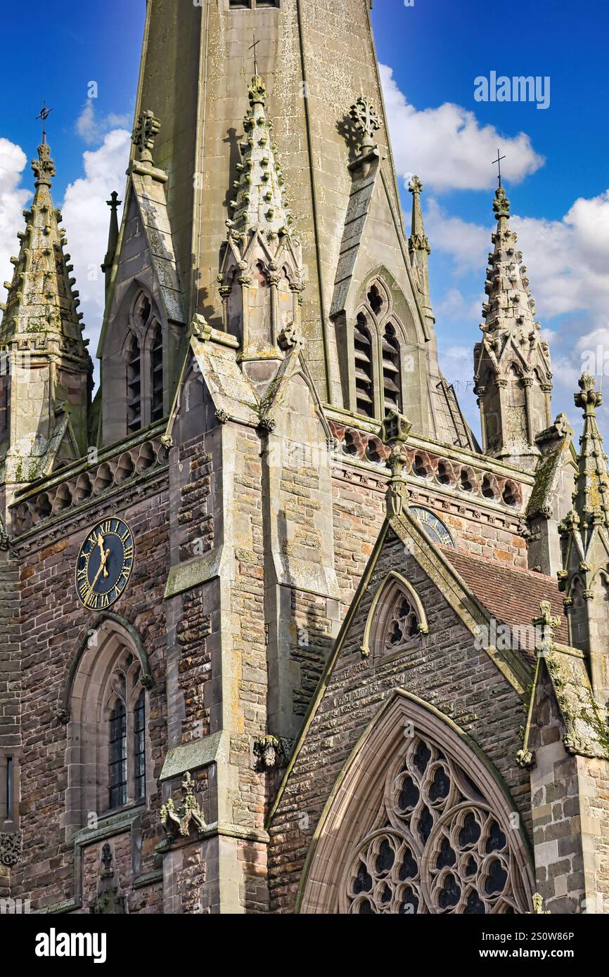 Close-up view of a church steeple's intricate stonework, featuring a ...
