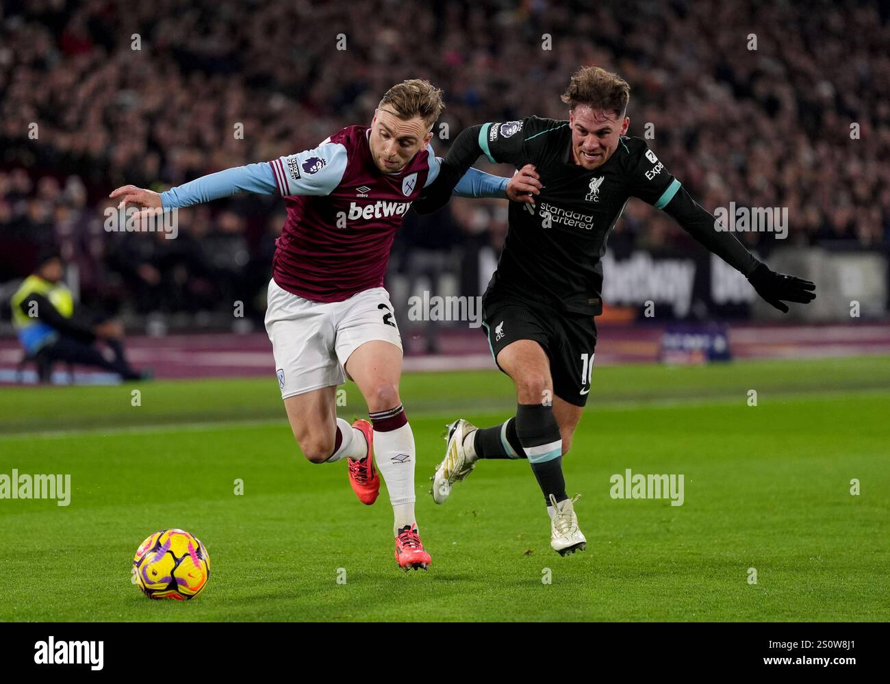 West Ham United's Jarrod Bowen (left) and Liverpool's Alexis Mac ...