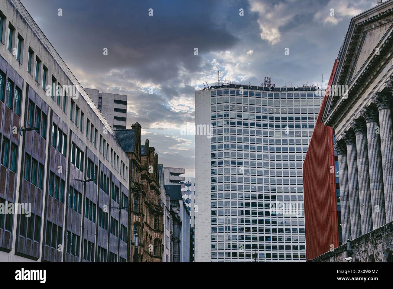 Cityscape showcasing a variety of architectural styles under a partly ...