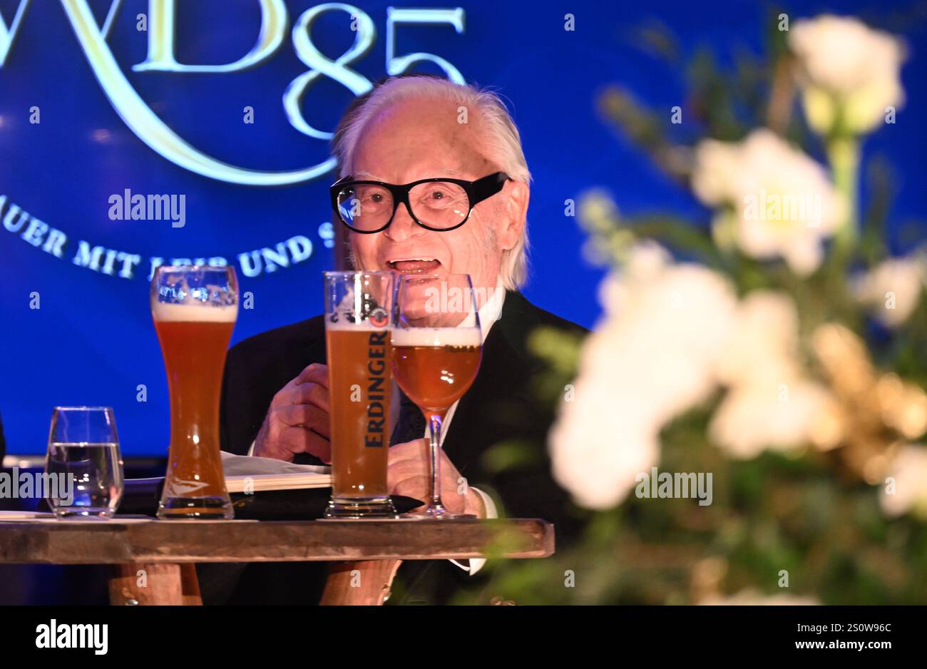 Munich, Germany. 29th Dec, 2024. Erdinger boss Werner Brombach speaks ...
