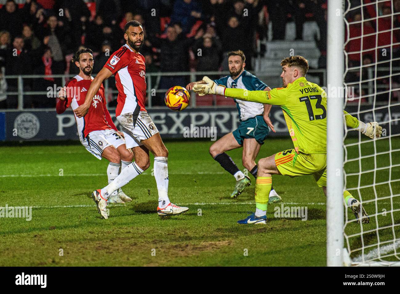 Morecambe FC's Gwion Edwards shoots across the goal mouth during the ...