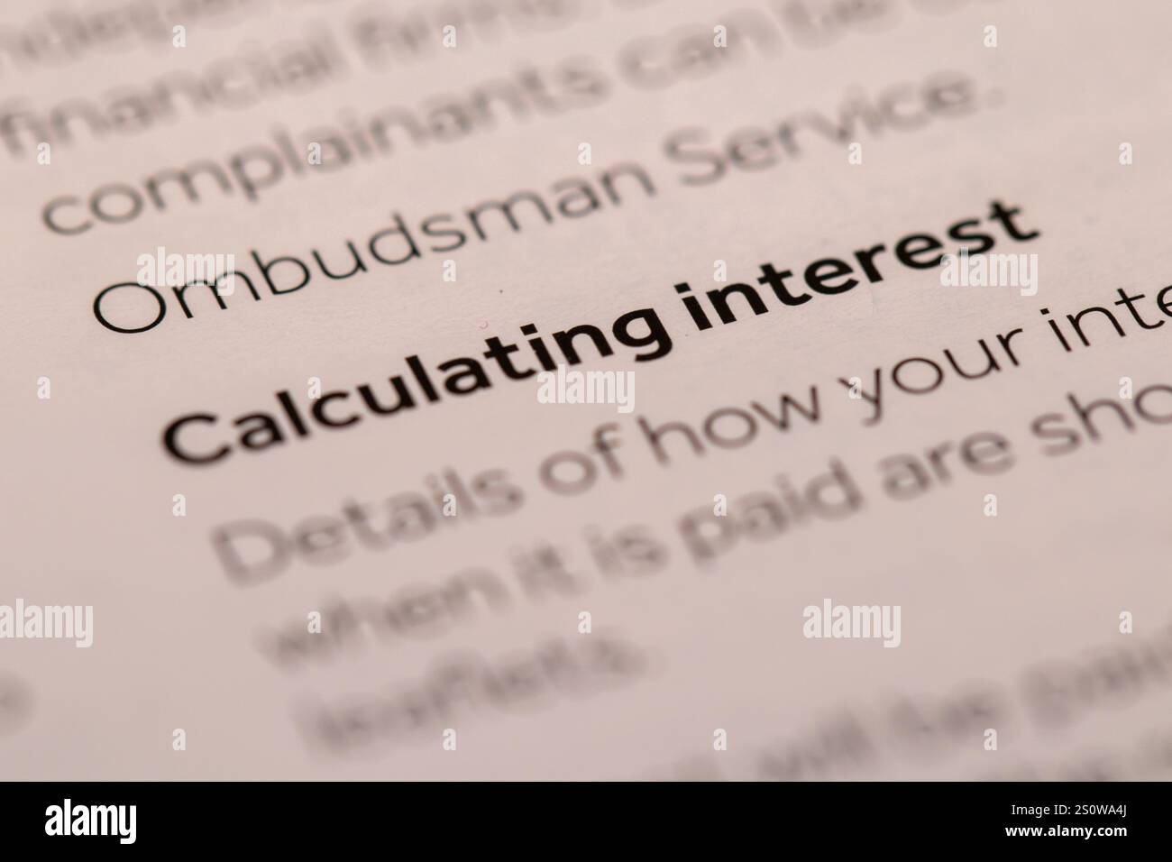Close-up view of a document detailing interest calculation. The words ...