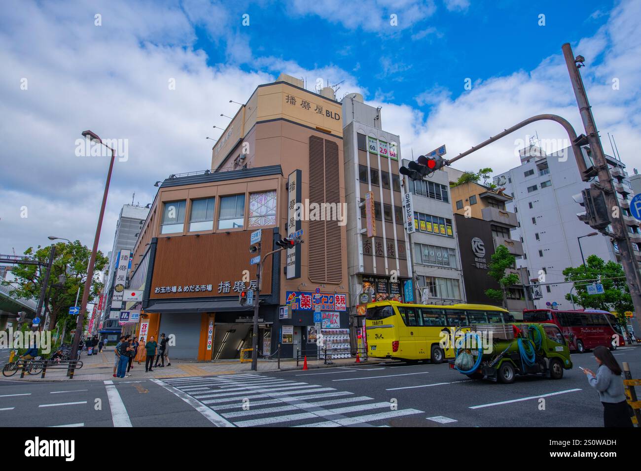 Modern commercial buildings on Sakai suji Avenue at Sennichimae-dori ...