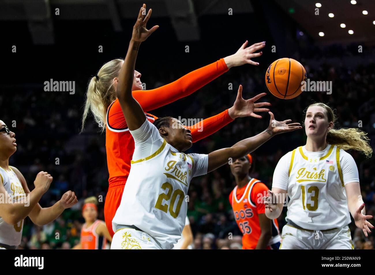 Notre Dame forward Liatu King (20) and Virginia center Taylor ...