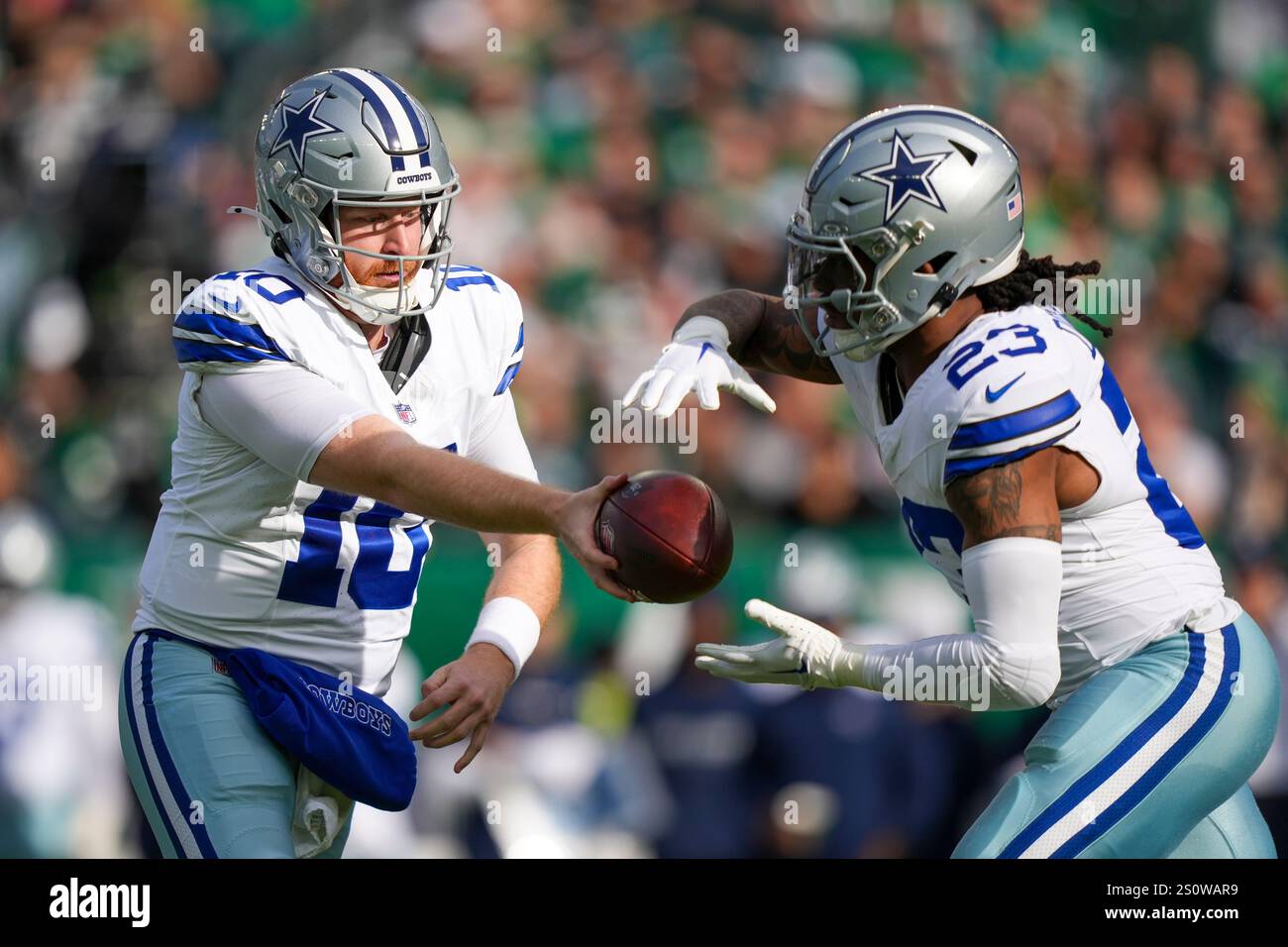 Dallas Cowboys running back Rico Dowdle (23) takes the handoff from ...