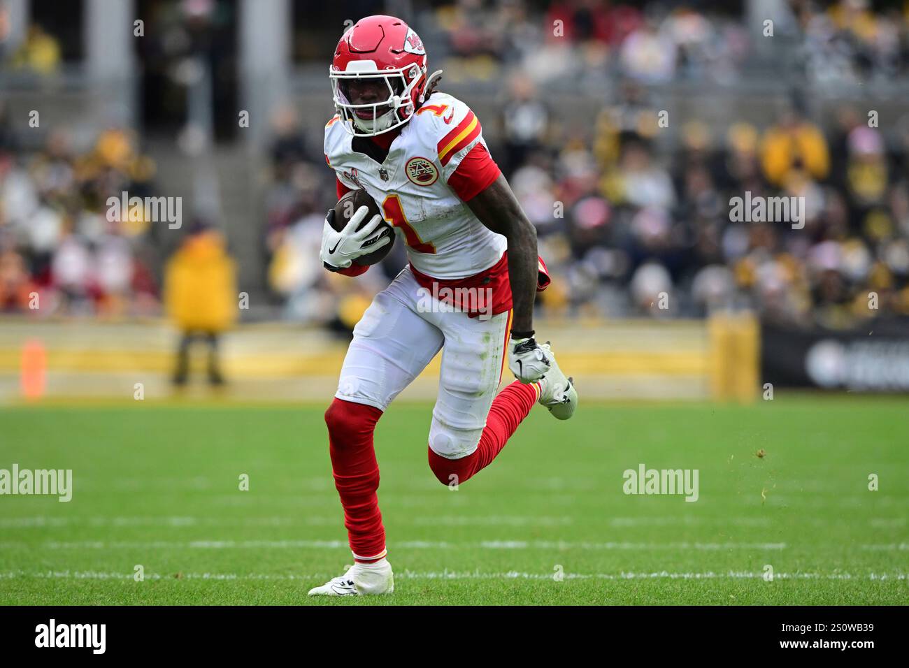 Kansas City Chiefs wide receiver Xavier Worthy runs after a reception ...