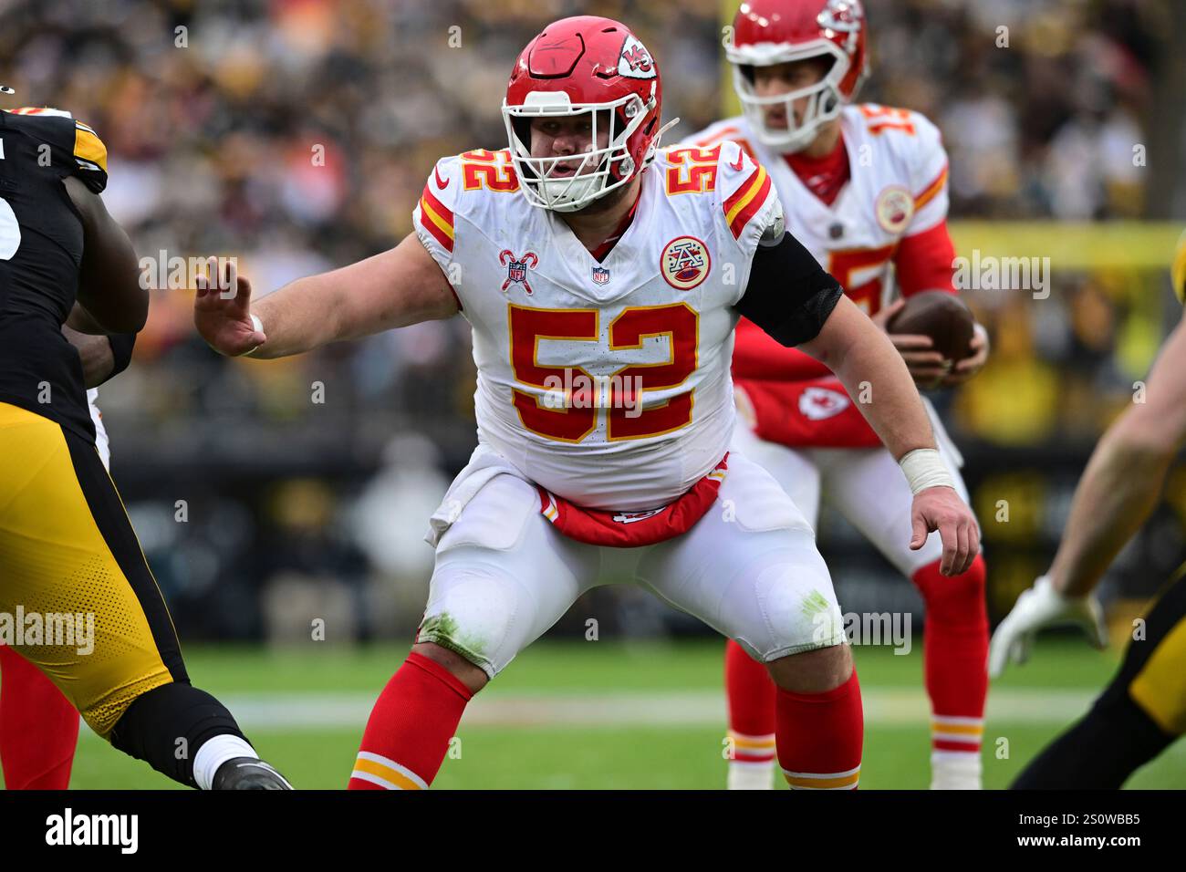 Kansas City Chiefs center Creed Humphrey looks to block during the ...