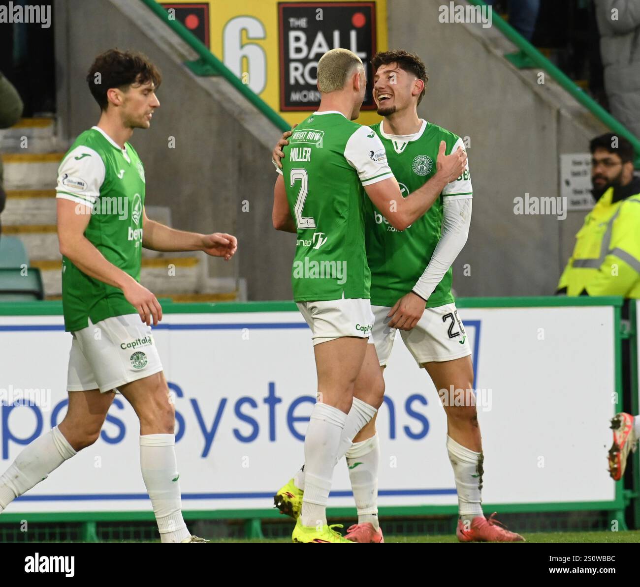 Hibs lewis miller congratulates scorer nectarios triantis hi-res stock ...