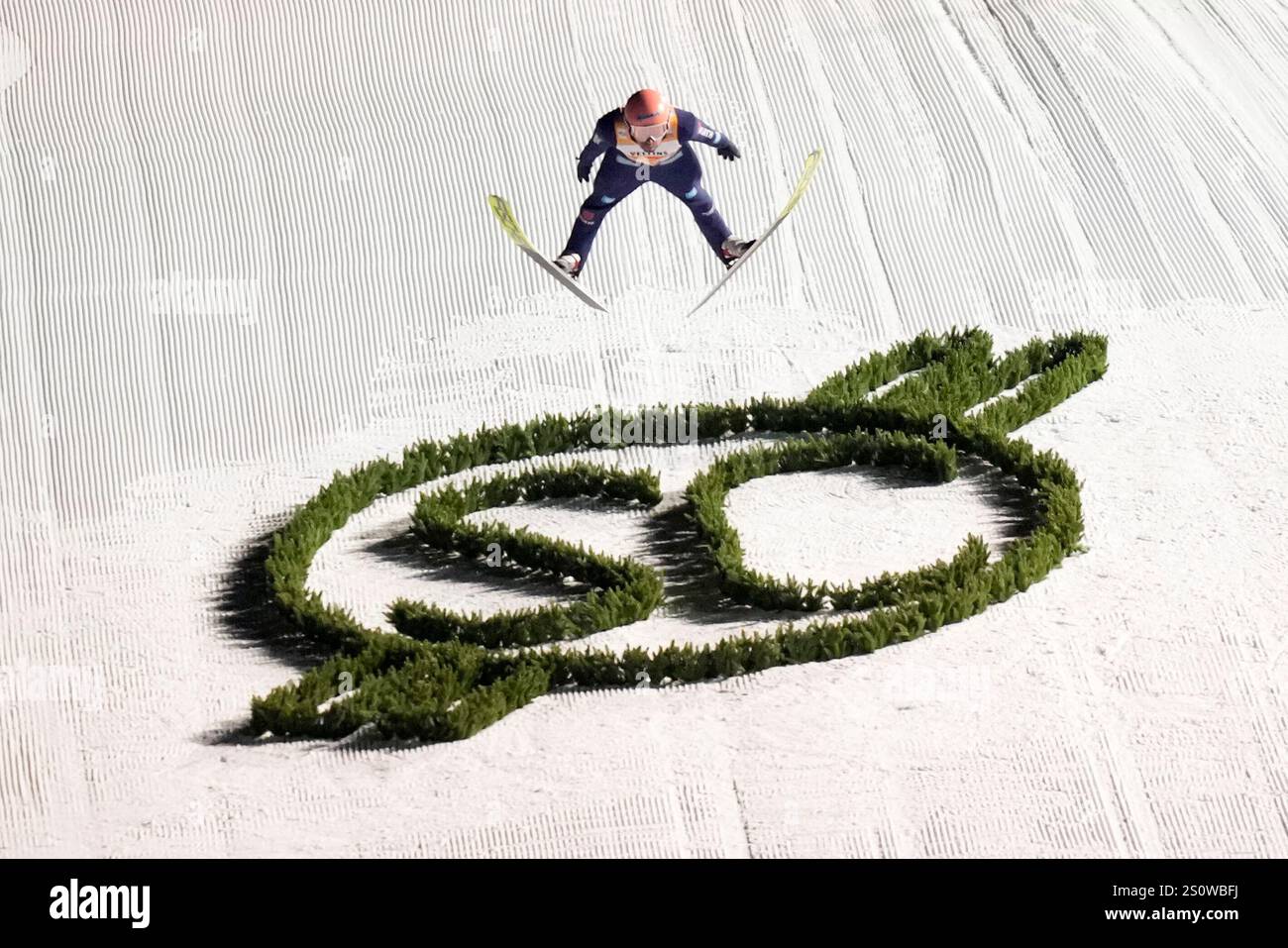 Pius Paschke, of Germany, soars through the air during his second round ...