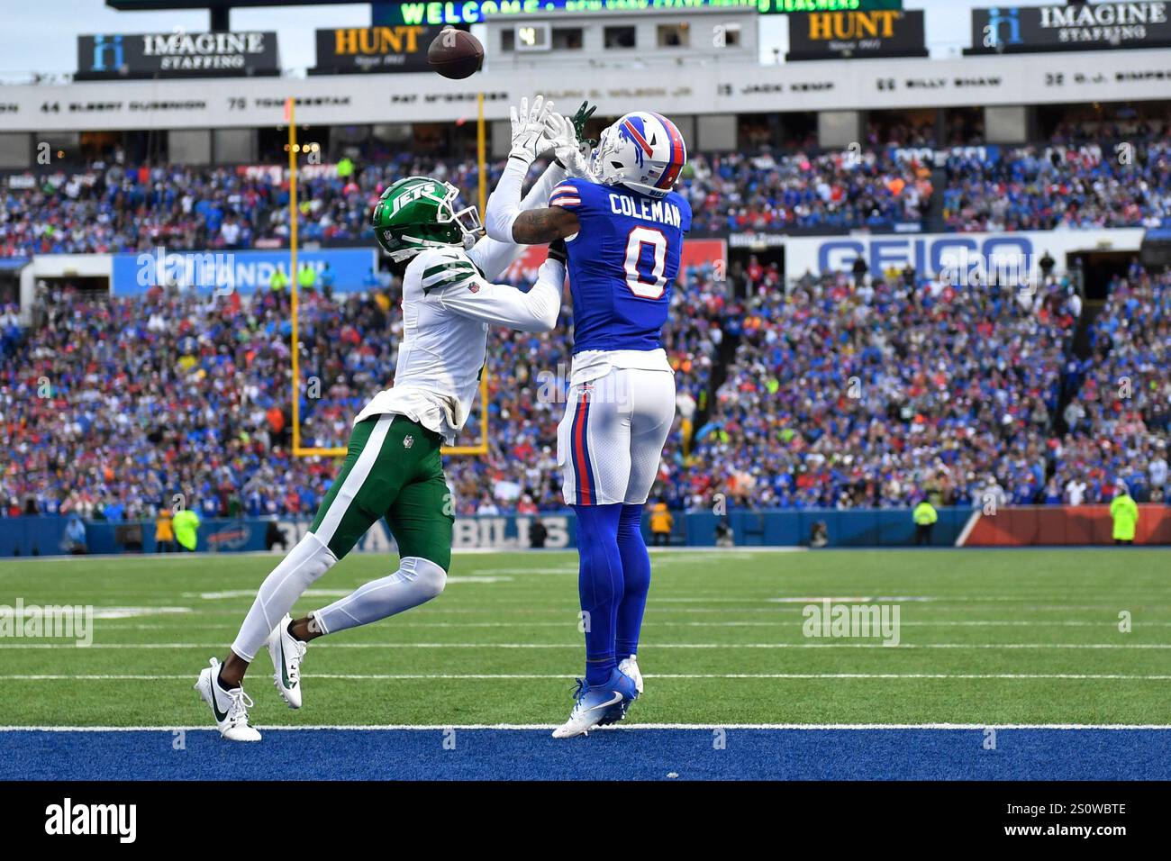 New York Jets cornerback Sauce Gardner, left, breaks up a pass intended ...