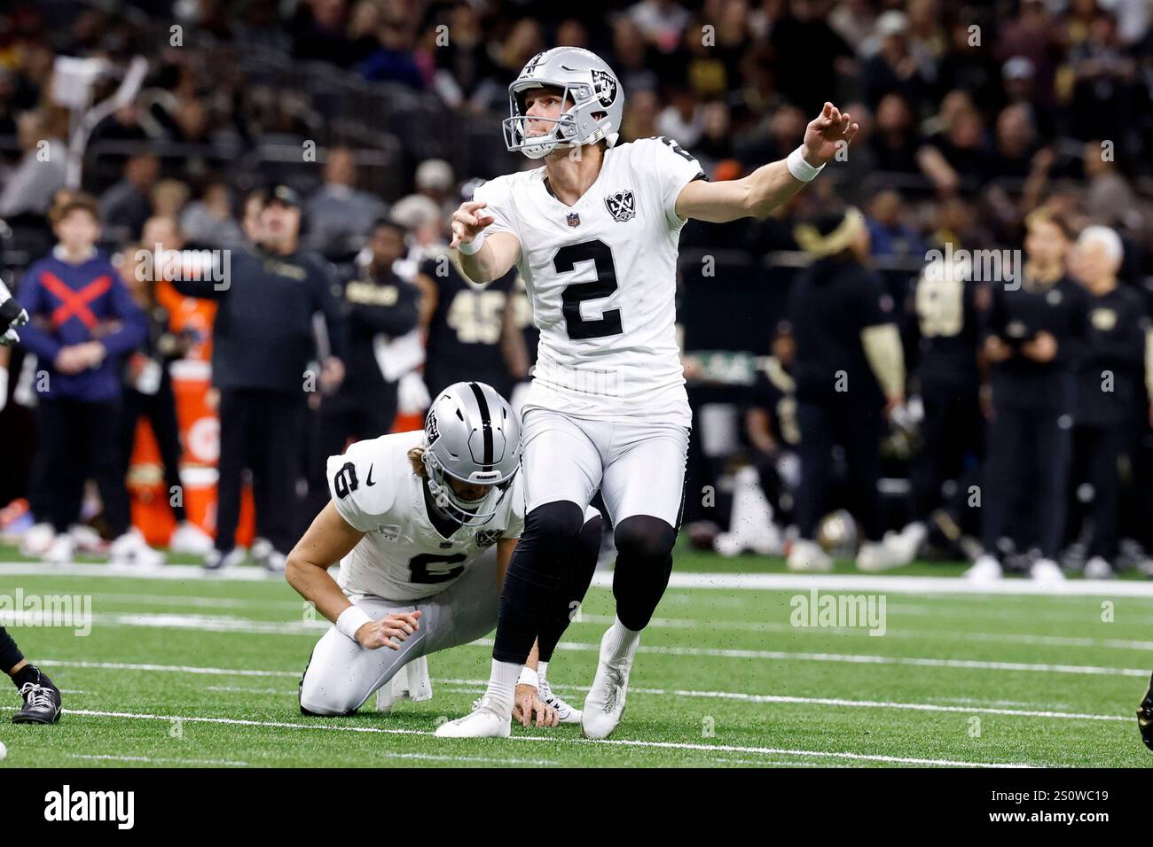 Las Vegas Raiders place kicker Daniel Carlson (2) kicks a 31-yard field ...
