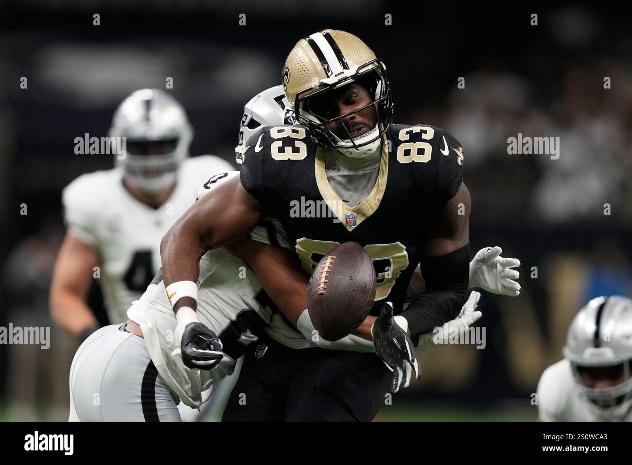Las Vegas Raiders safety Isaiah Pola-Mao breaks up a pass intended for ...