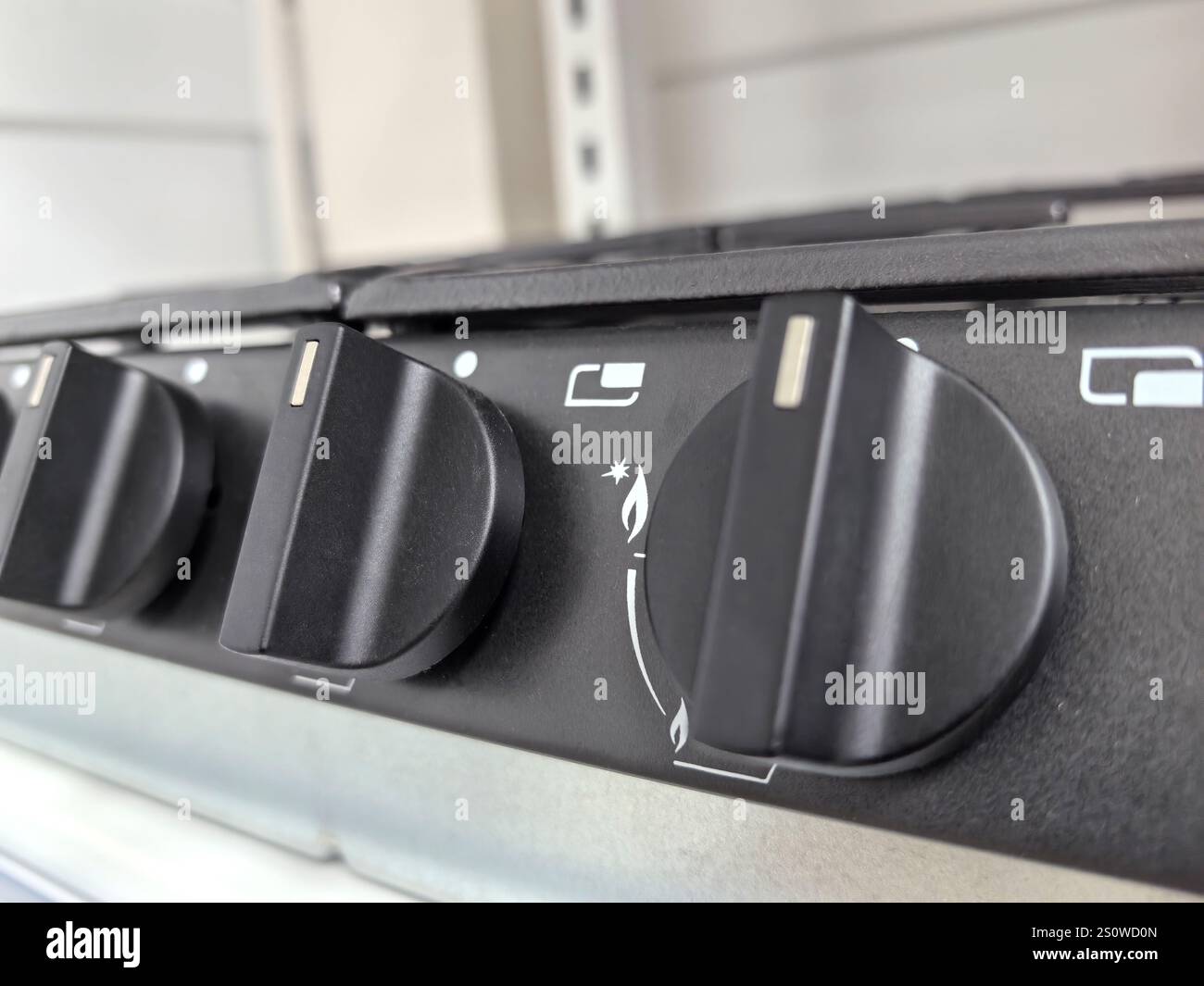 A detailed look at the appliance control knobs reveals their polished ...