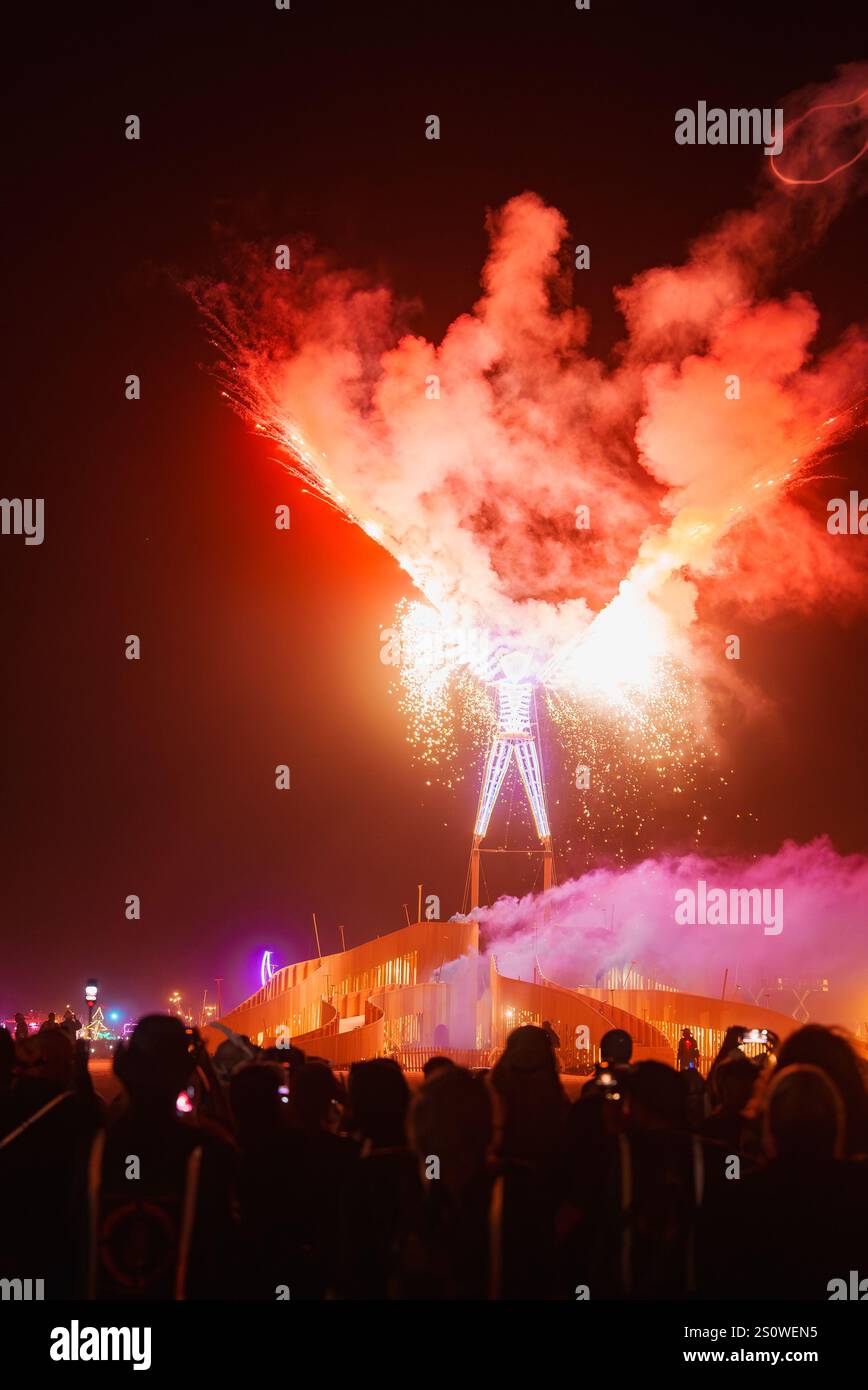 Burning Man Festival Night Scene with Flaming Effigy and Fireworks ...