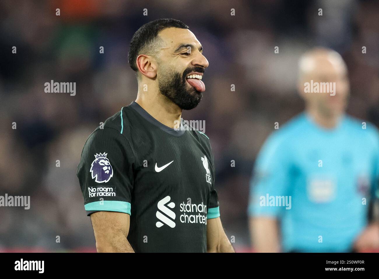 Mohamed Salah of Liverpool sticks his tongue out and smiles during the ...