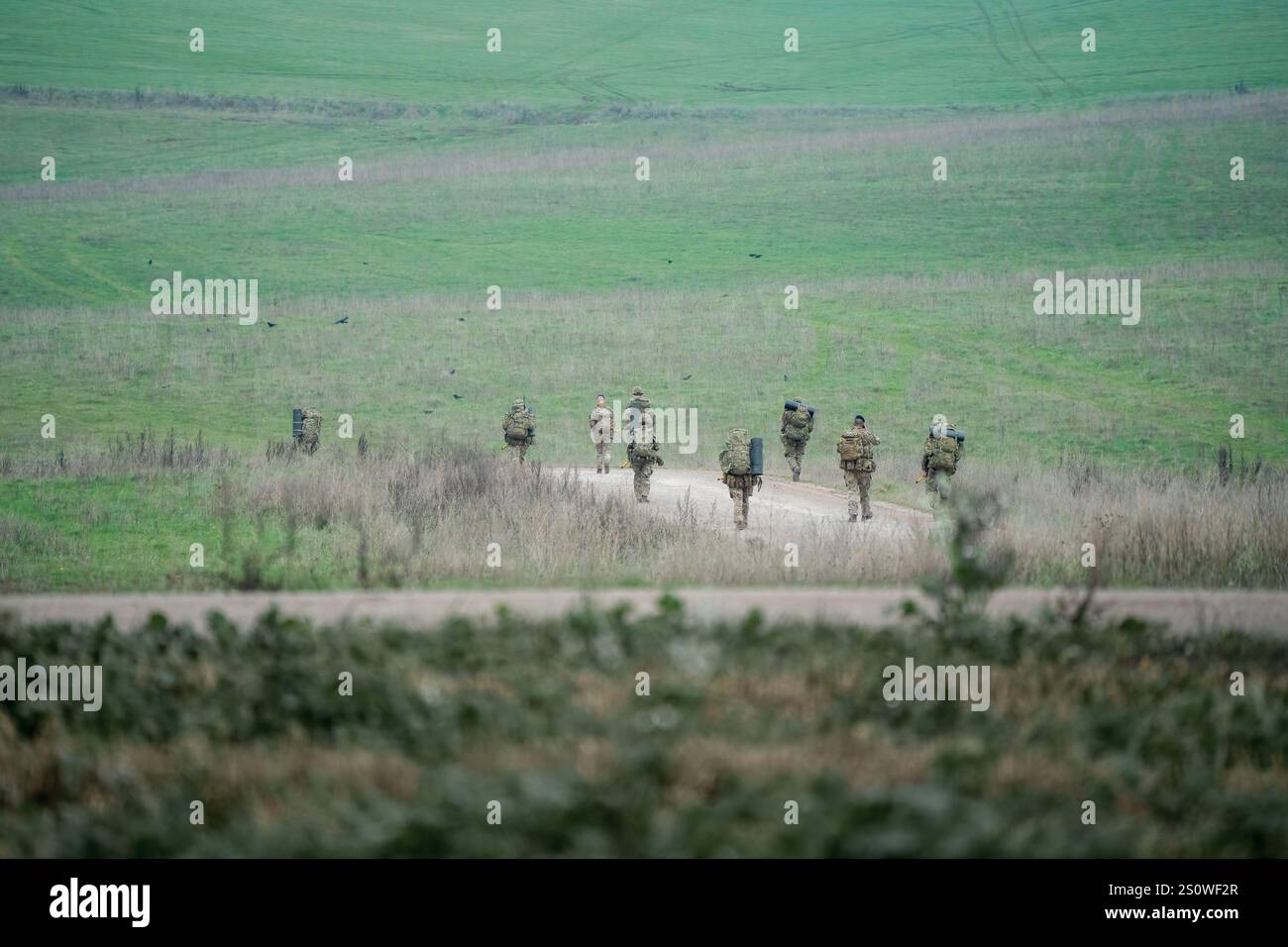 a unit of British army soldiers on a 40kg loaded march tab military ...