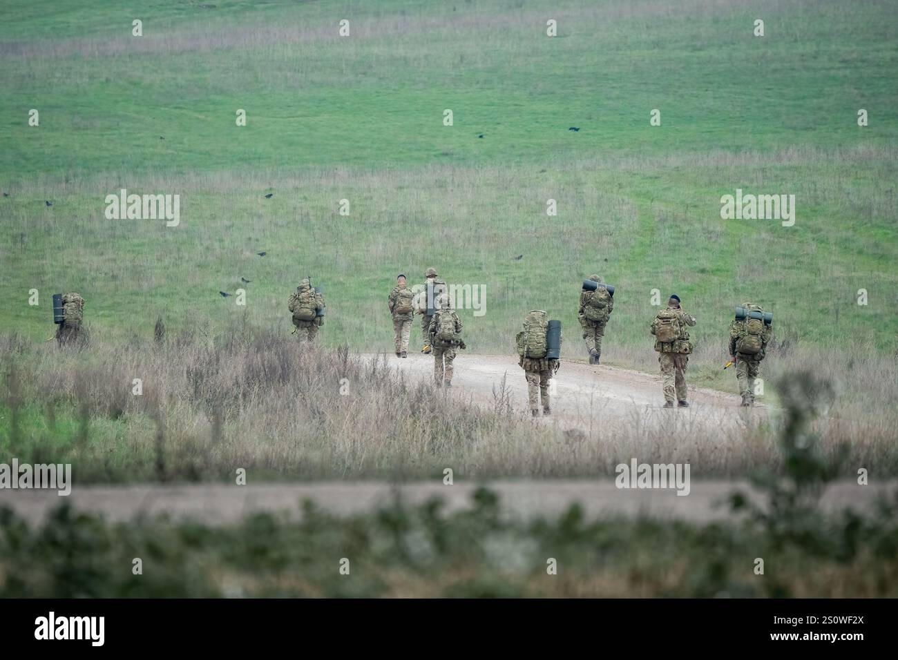 a unit of British army soldiers on a 40kg loaded march tab military ...