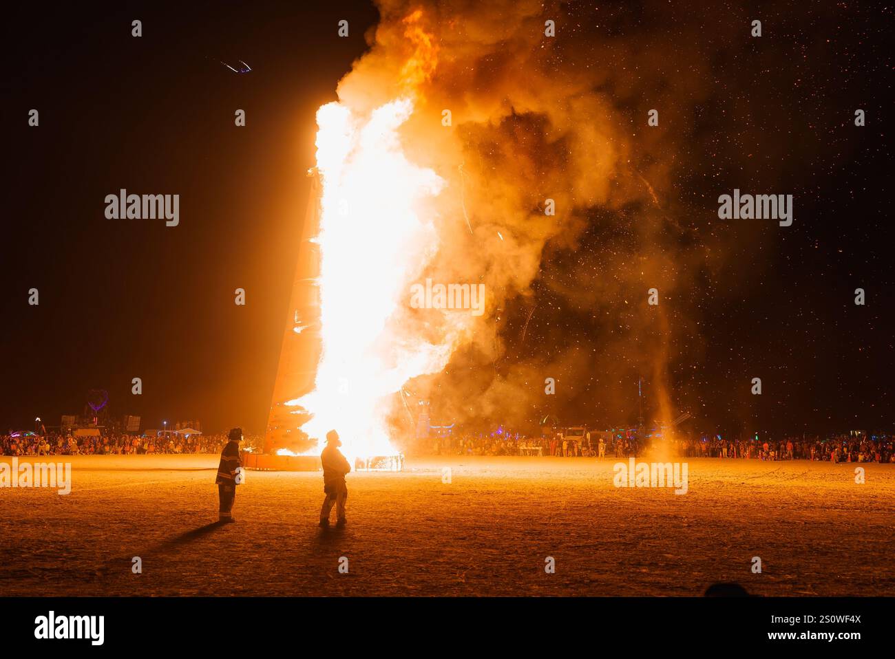 Burning Man Festival Night Scene with Flaming Art Installation Stock ...