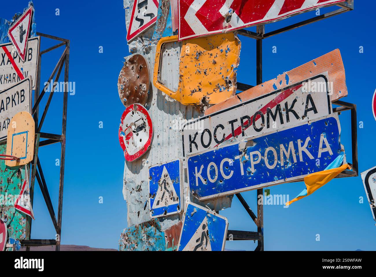 Collection of Bullet Riddled Road Signs in Desert Setting Stock Photo ...