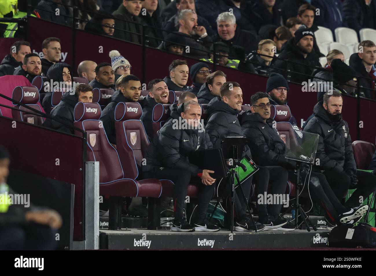 Andrew Robertson of Liverpool laughing on the away bench during the ...