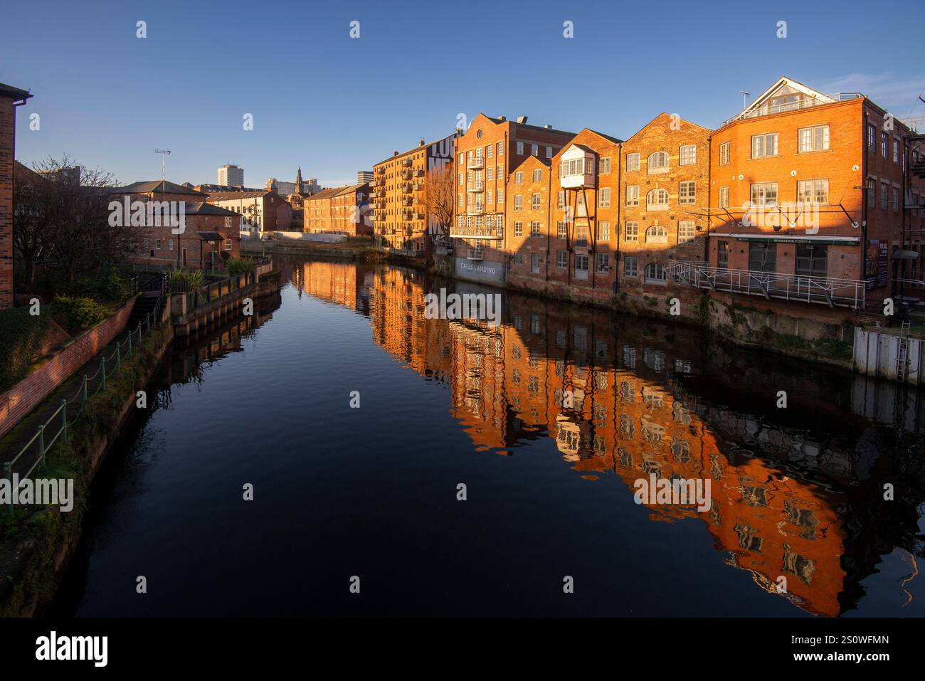 Converted warehouses to the west of Centenary Bridge on the River Aire ...