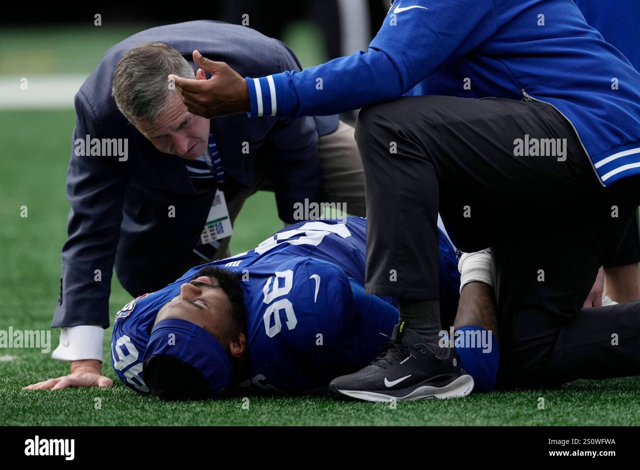 New York Giants defensive tackle Armon Watts (96) is attended to after ...