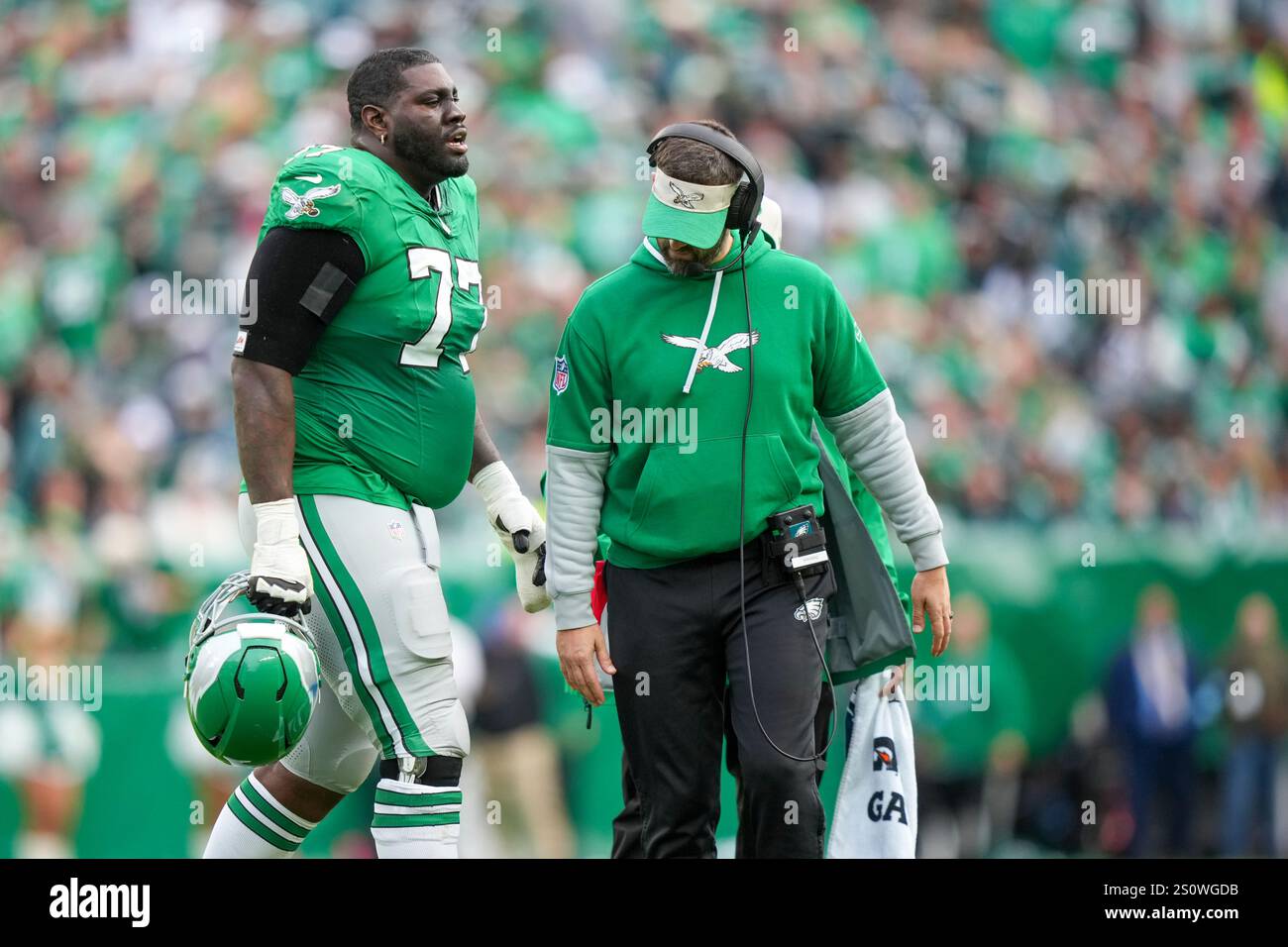 Philadelphia Eagles head coach Nick Sirianni, right, checks on ...