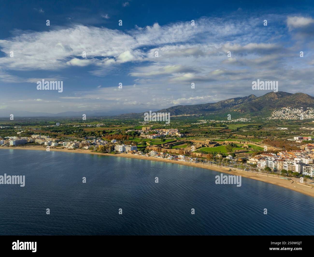 Aerial view of the city of Roses, between the Gulf of Roses and Cap de ...
