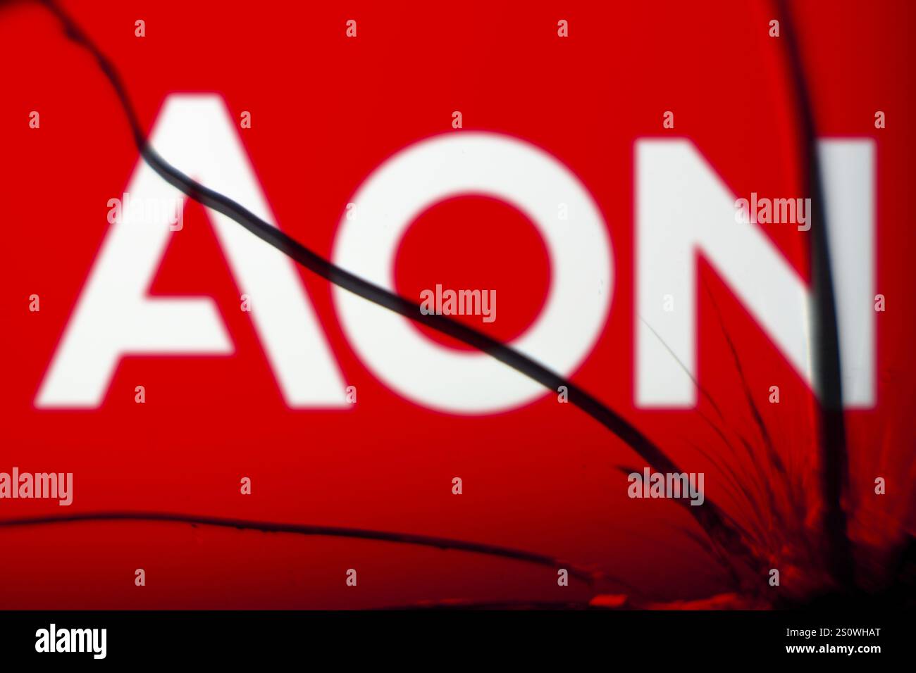 Aon logo is visible on the broken glass Stock Photo - Alamy