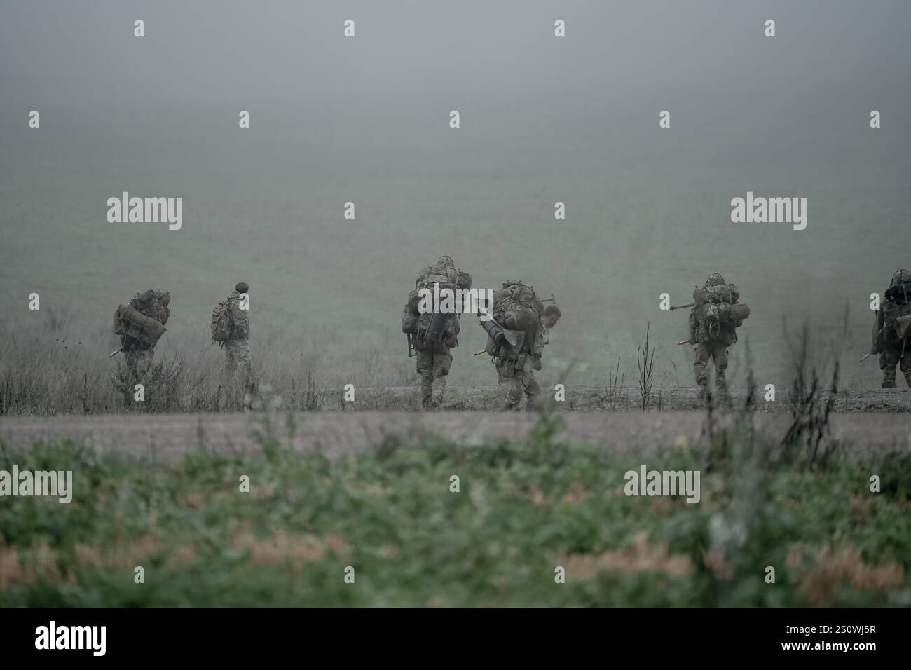 a unit of British army soldiers on a 40kg loaded march tab military ...