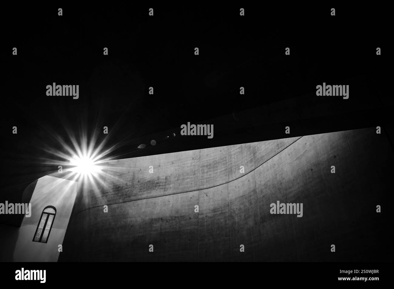 Light beam hits concrete surface and creates dramatic contrasts, Rome ...