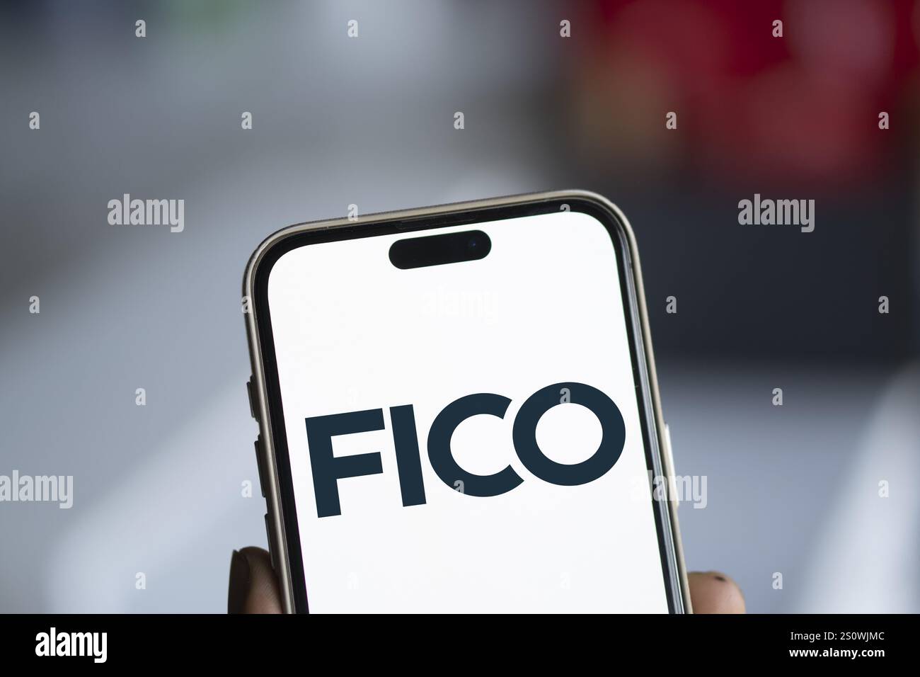 FICO logo is displayed on smartphone. FICO is an American data analytics company Stock Photo - Alamy