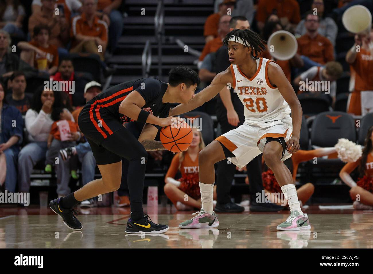 AUSTIN, TX - DECEMBER 29: Texas Longhorns guard Tre Johnson (20) plays ...