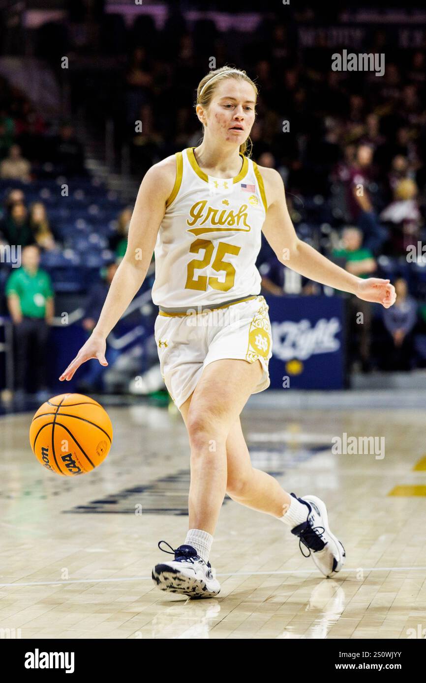 South Bend, Indiana, USA. 29th Dec, 2024. Notre Dame guard Sarah Cernugel (25) dribbles the ball ...