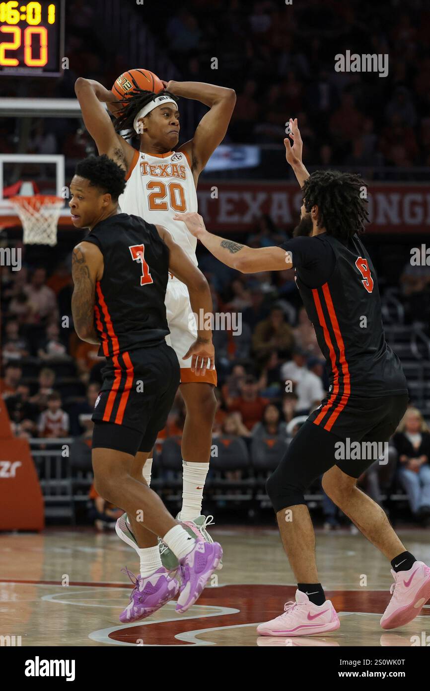 AUSTIN, TX - DECEMBER 29: Texas Longhorns guard Tre Johnson (20) leaps ...