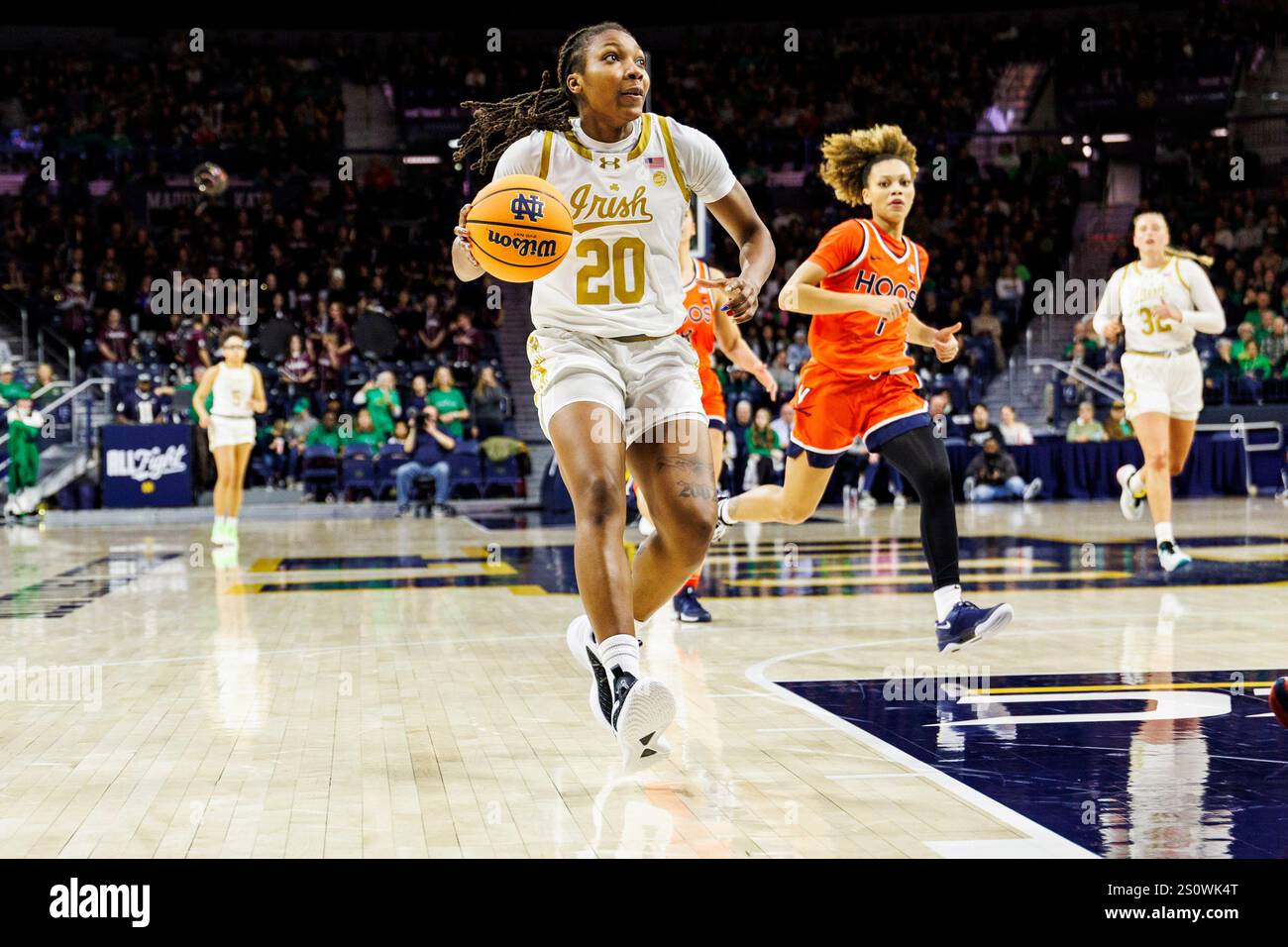 South Bend, Indiana, USA. 29th Dec, 2024. Notre Dame forward Liatu King (20) drives to the ...