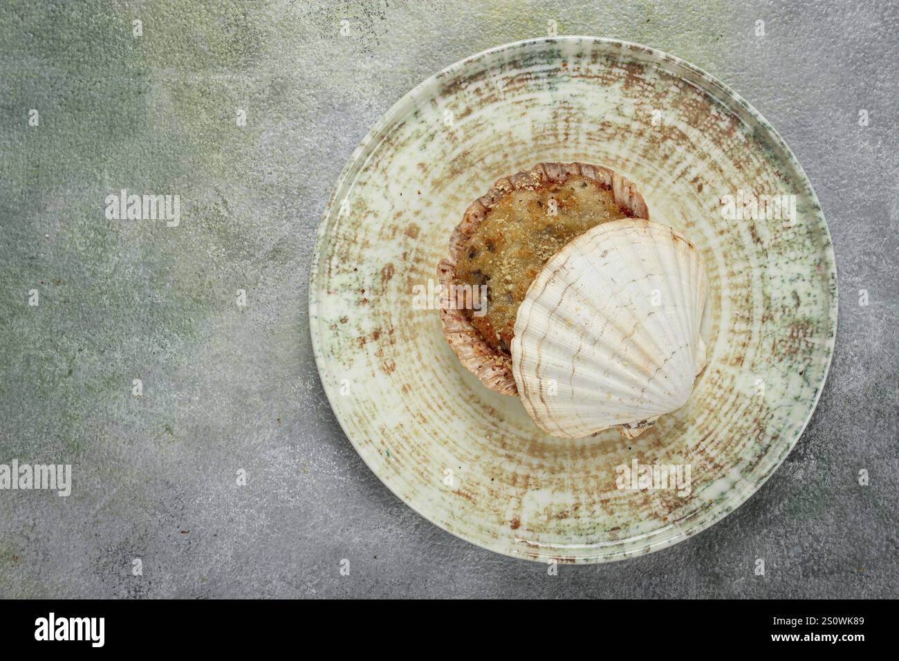 Scallop shells, stuffed, baked with cheese, in the oven, julienne with ...