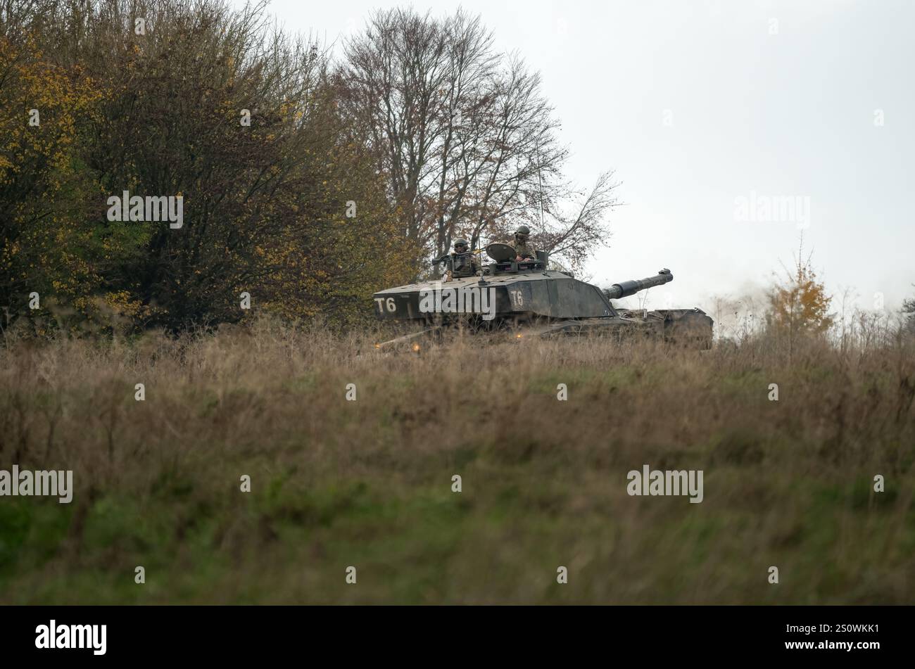 Commander and gunner directing a British army Challenger 2 II FV4034 ...