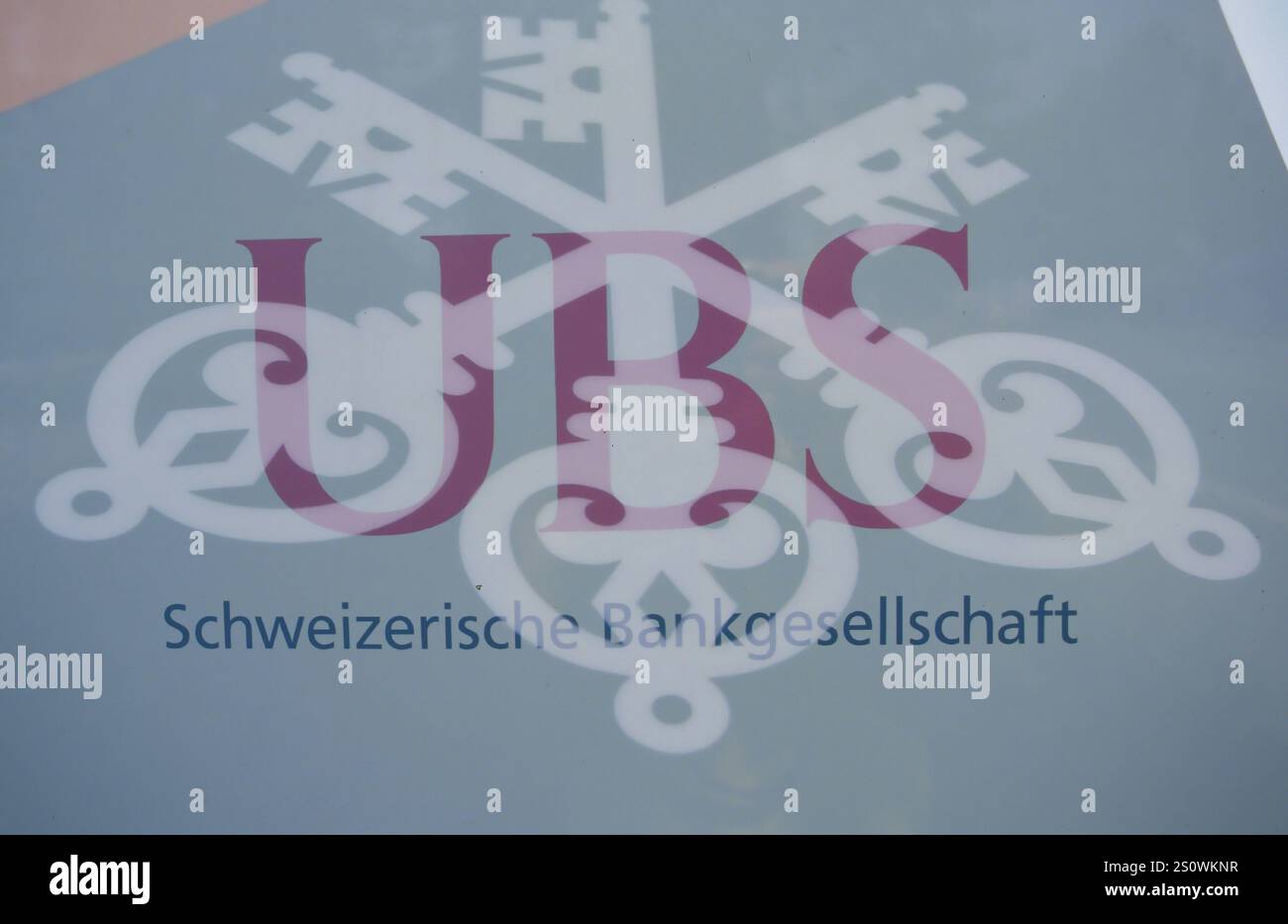 UBS logo with red letters and blue background, representing a Swiss ...