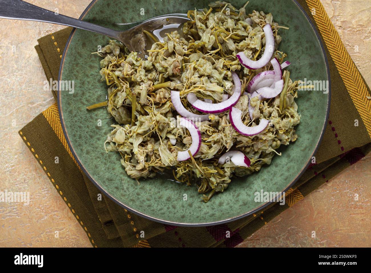 Jonjoli, Colchian klekachka, jonjoli salad, with red onion and butter ...