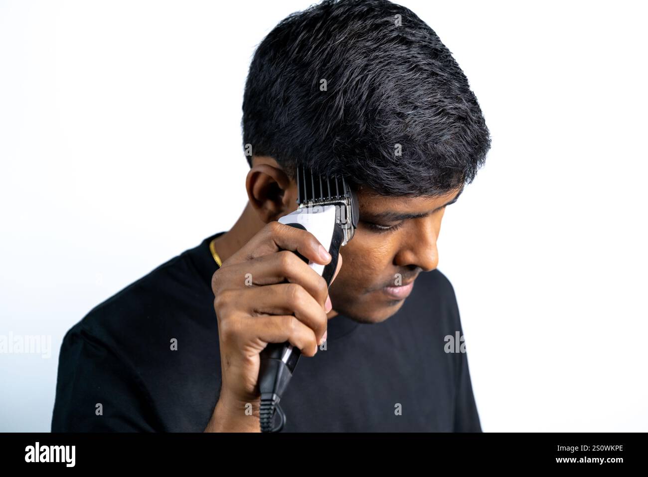 Barber giving close haircut clippers hi-res stock photography and ...