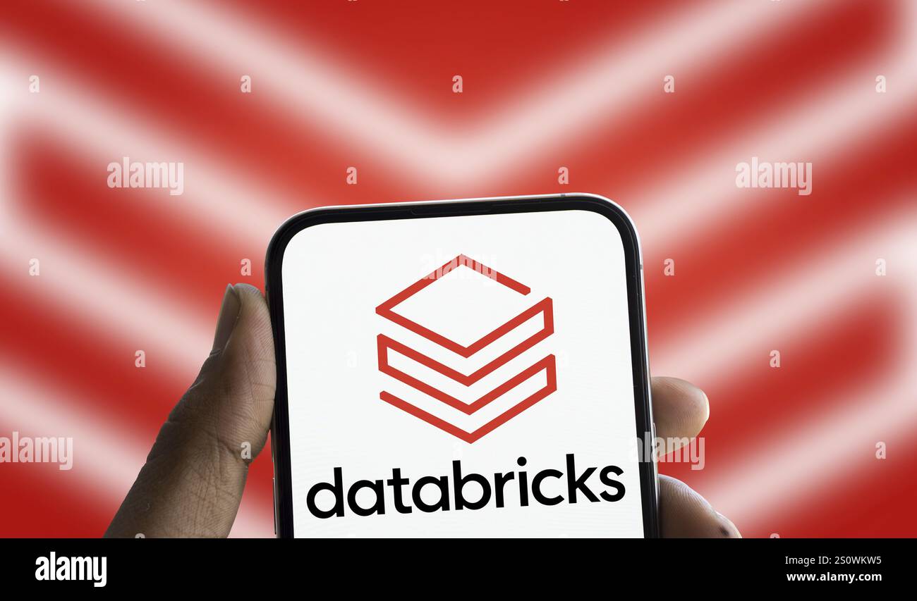 Databricks logo is displayed on smartphone. Databricks Inc is a global ...
