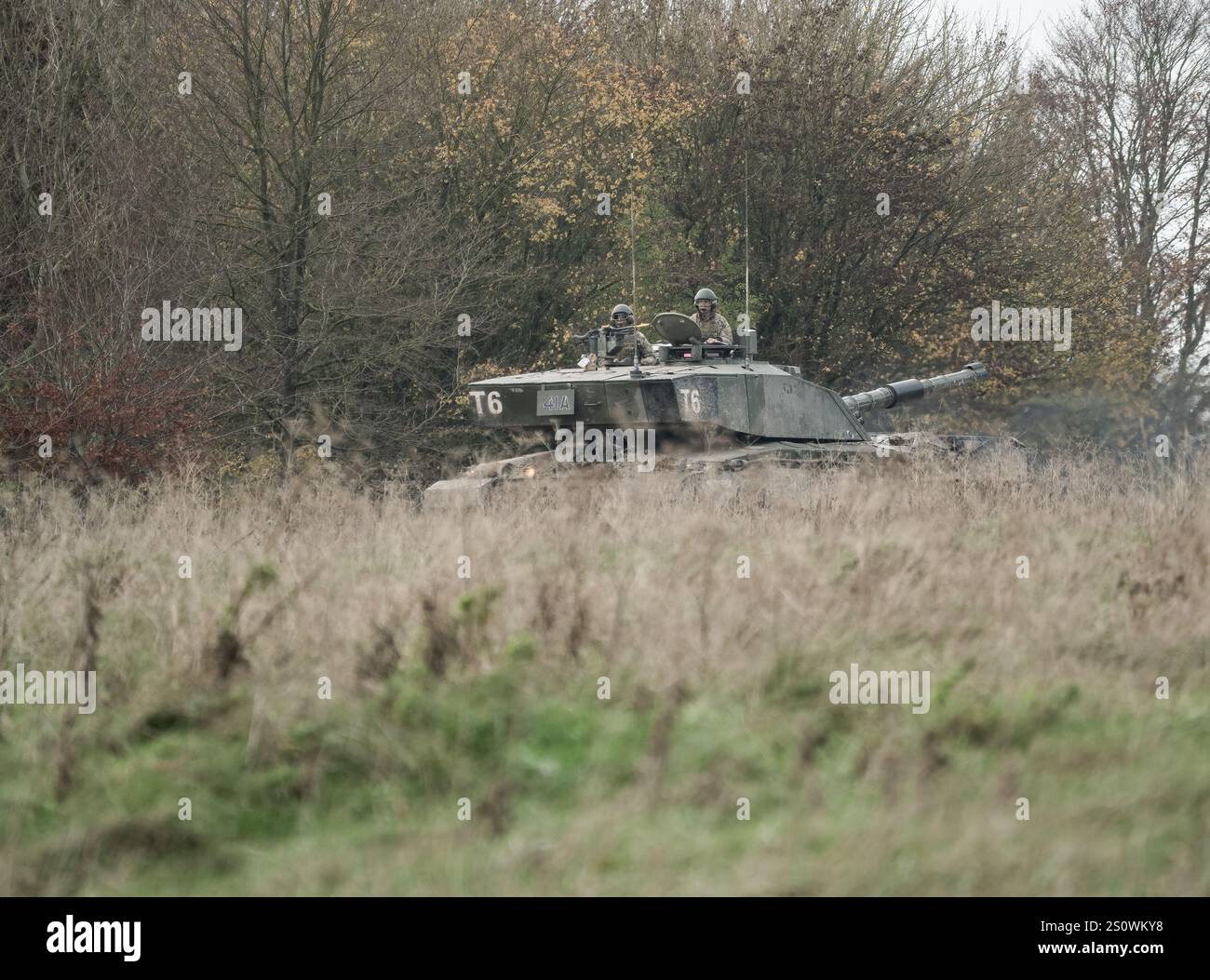 Commander and gunner directing a British army Challenger 2 II FV4034 ...