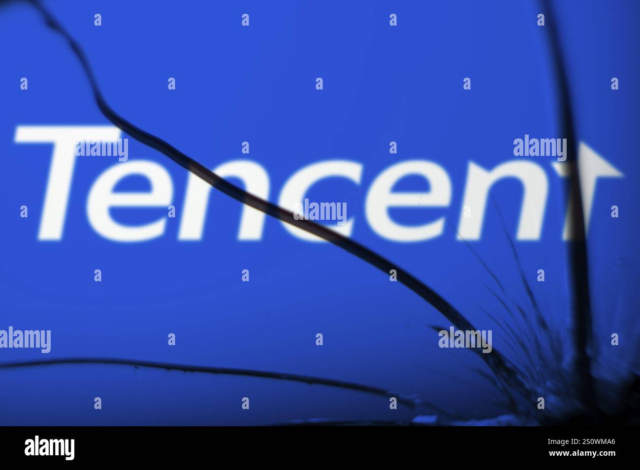 Tencent logo is visible on the broken glass. Tencent Holdings Ltd is a ...