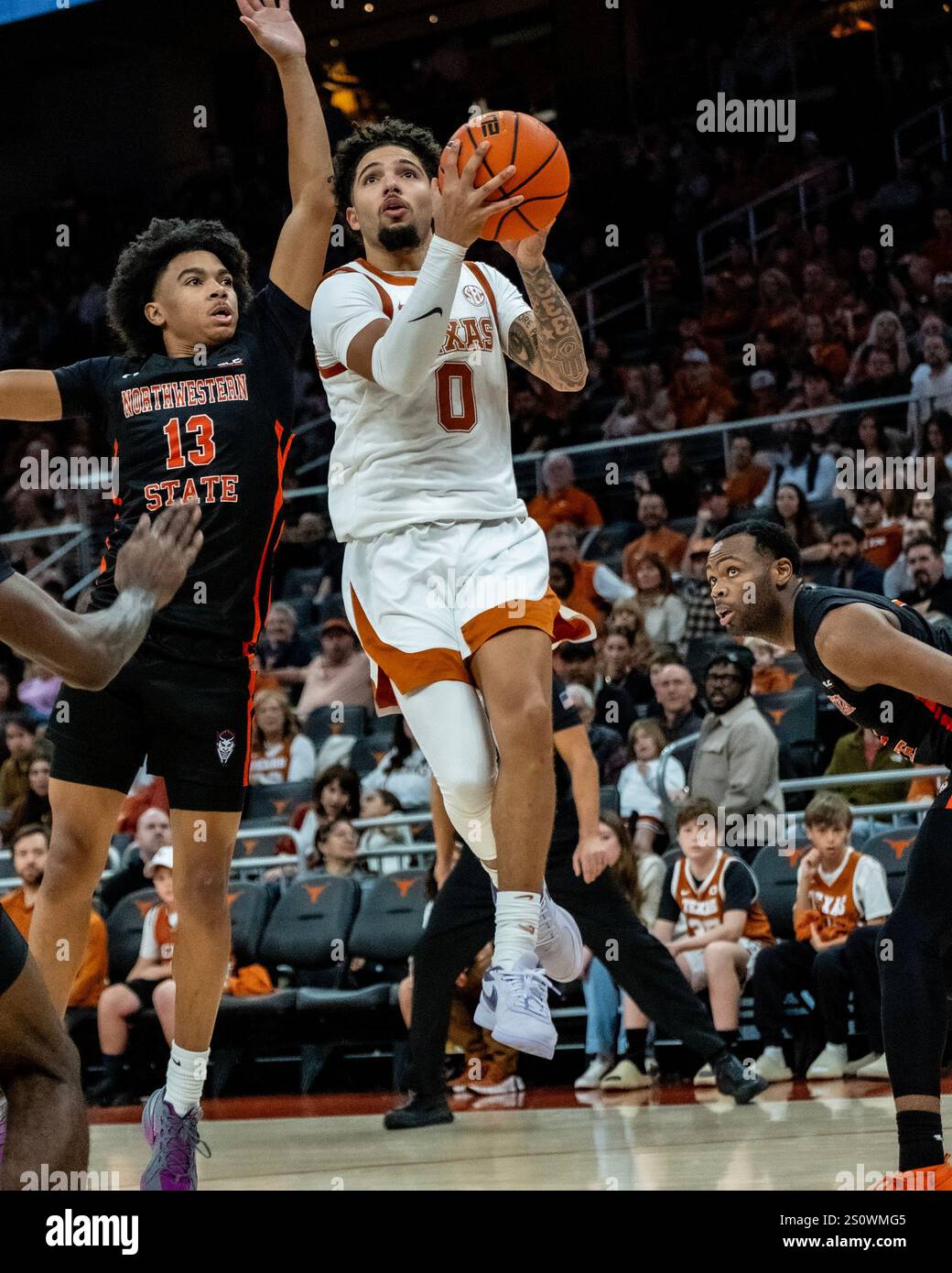 Texas, USA. 29th Dec, 2024. Jordan Pope (0) of the Texas Longhorns in ...