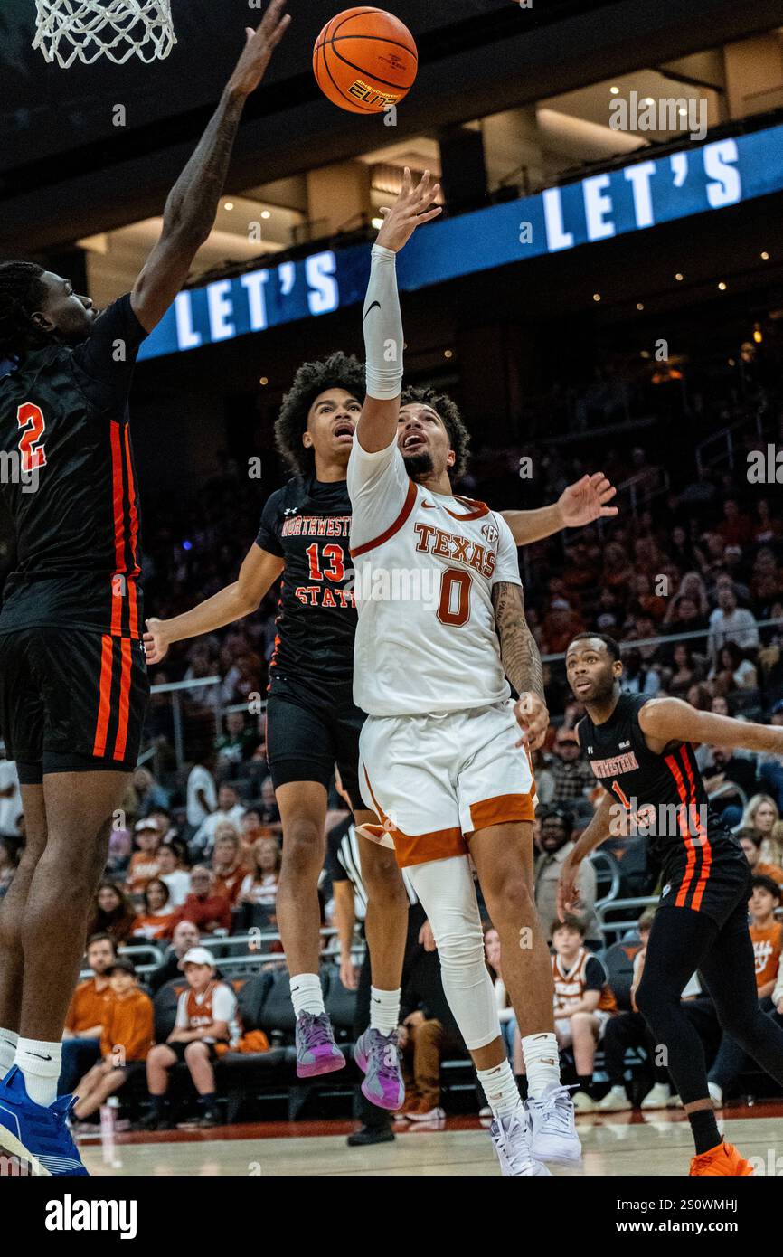 Texas, USA. 29th Dec, 2024. Jordan Pope (0) of the Texas Longhorns in ...