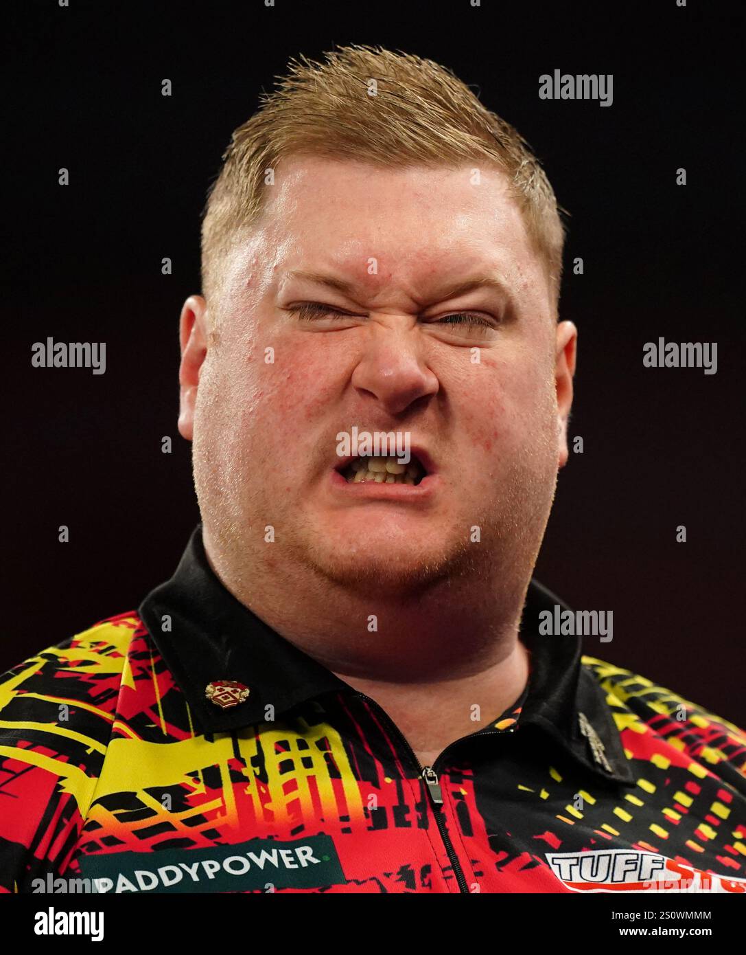 Ricky Evans reacts during his third round match against Robert Owen ...