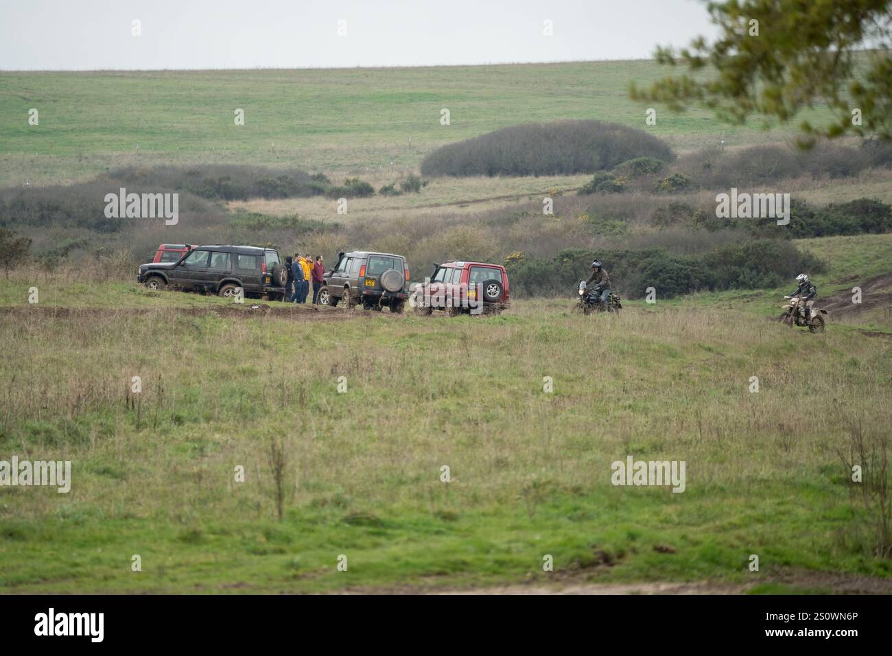 a group of 4x4 land rover discovery series II preparing to off-road ...